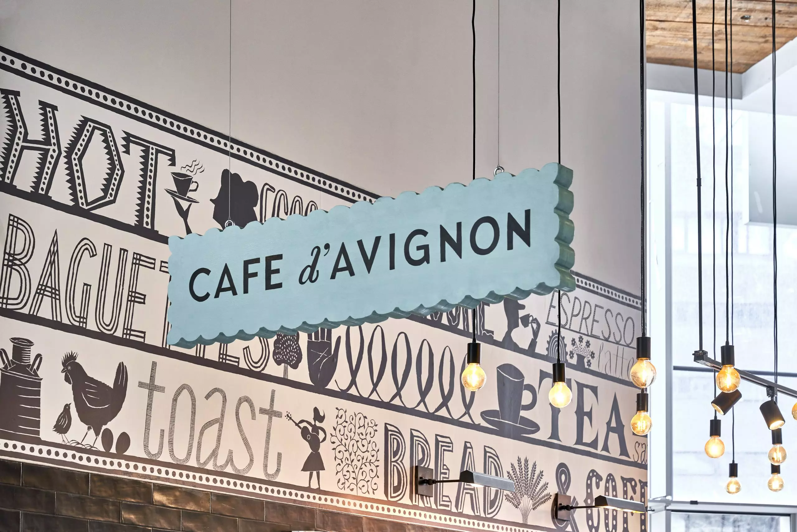 Mucca serveix la tradició del vell món a Nova York amb una identitat encantadora per al Cafe d'Avignon 27309_2