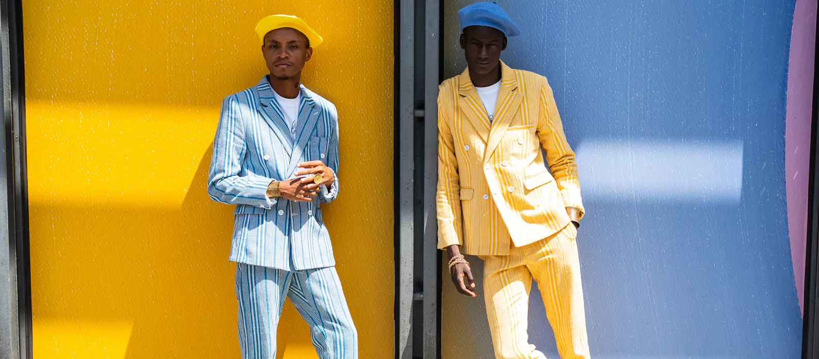 Kente Gentlemen Designer Aristide Loua está em uma jornada tão vibrante quanto suas roupas